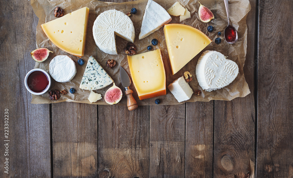 various types of cheese on rustic table top view Stock Photo | Adobe Stock