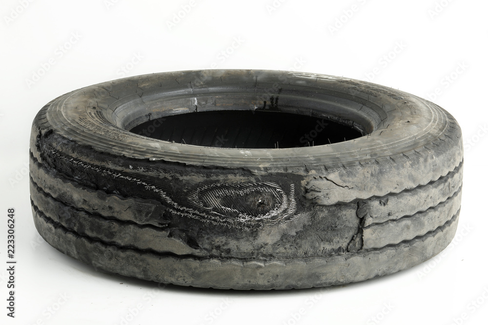 Worn truck wheel on white background. Types of wear Wheels. Stock Photo ...