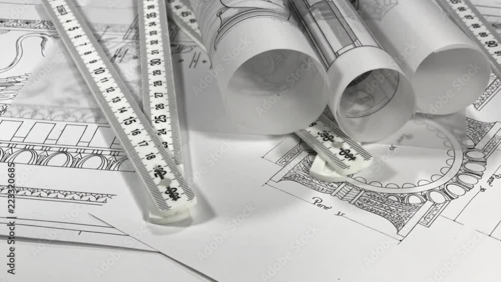 Blueprints - rolls of architectural drawings, yardstick - folding ruler ...