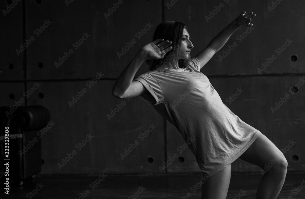 young beautiful woman professional dancer dancing during a rehearsal in ...