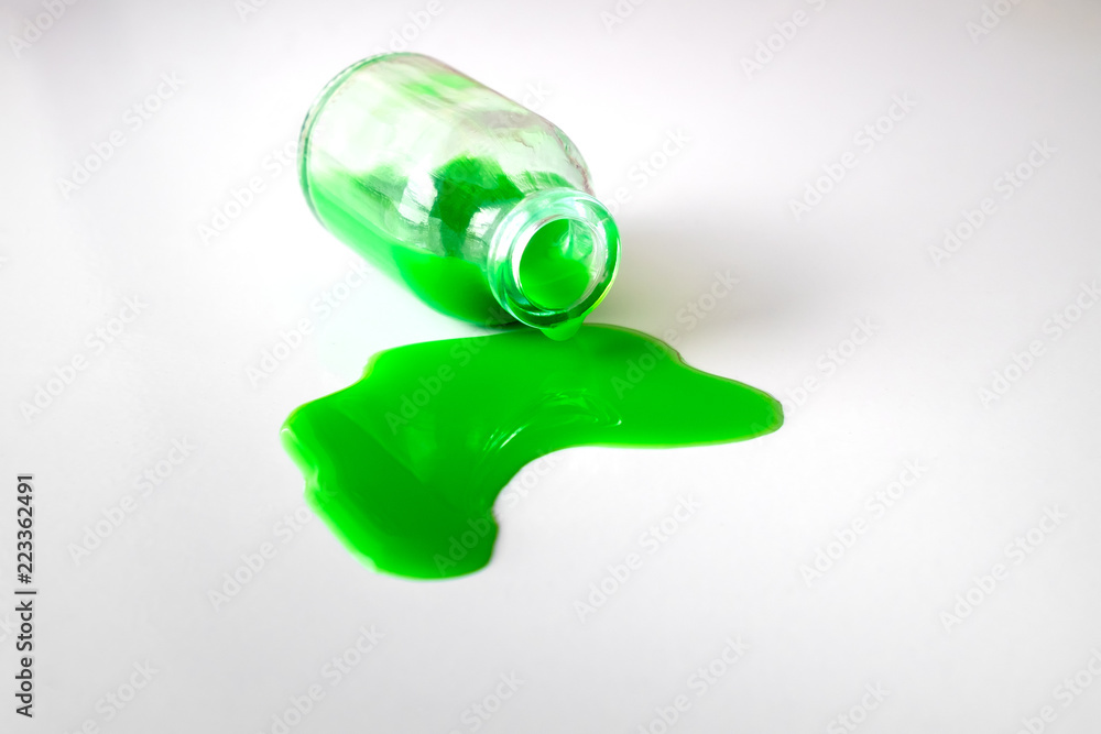 liquid of green color flows from a glass buylka Stock Photo | Adobe Stock