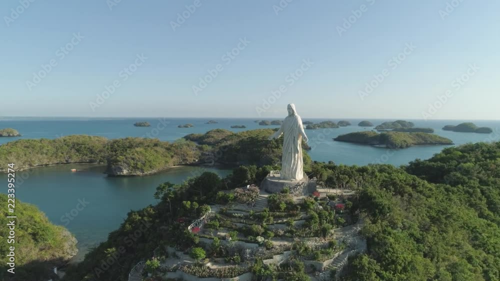 Statue of Jesus Christ on Pilgrimage island in Hundred Islands National ...