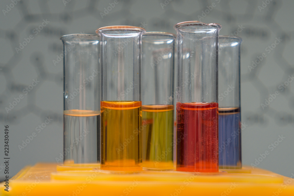 test tubes with colored fluids in a chemistry laboratory - structural ...