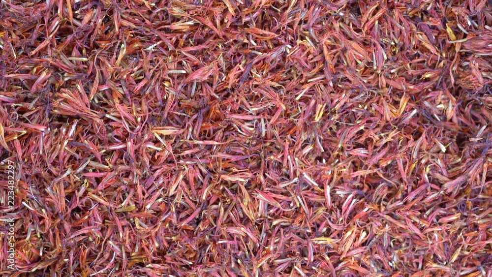 Saffron threads close up rotation loopable 4k top view. Food background ...