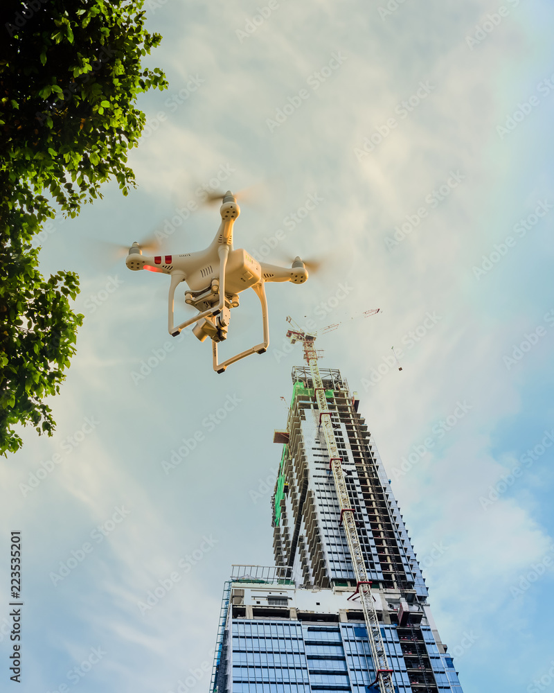 Drone over construction site of modern office and residential building ...
