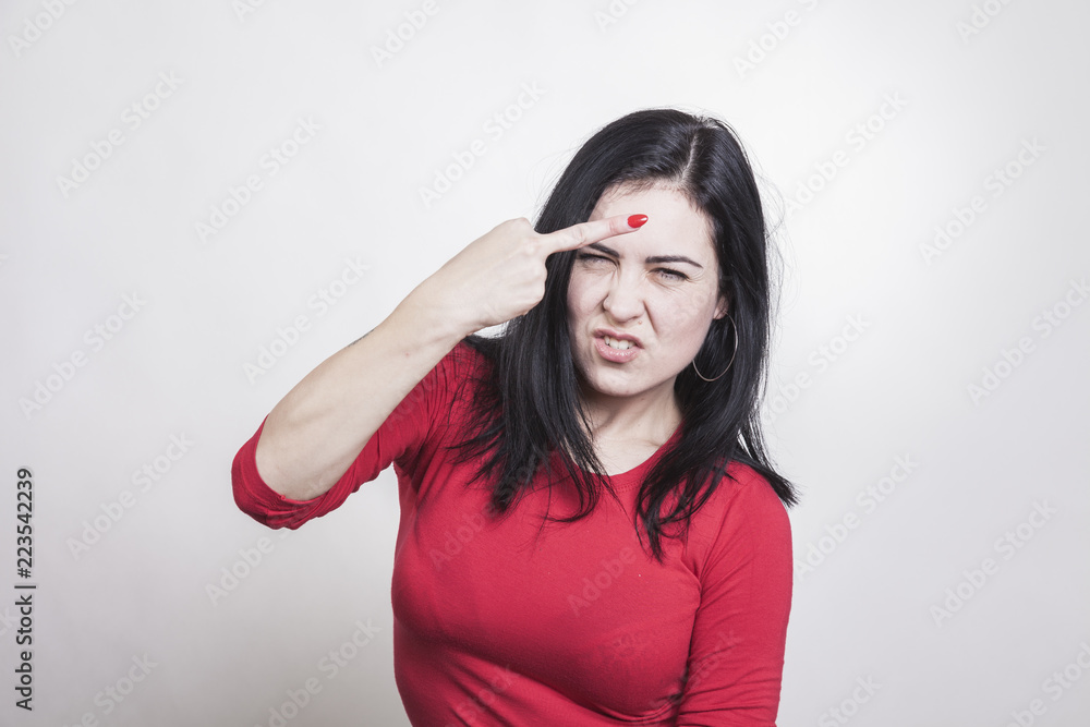 woman in red shirt shows her middle finger to someone who bothered her ...