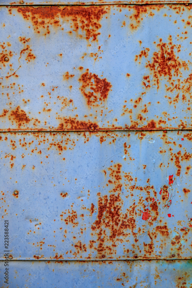 Rusted Metal Plate With Rivets