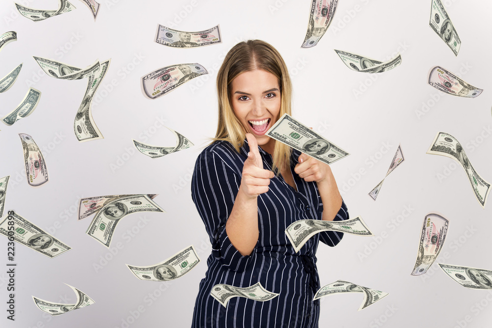 beautiful happy blond girl with money falling down Stock Photo | Adobe ...
