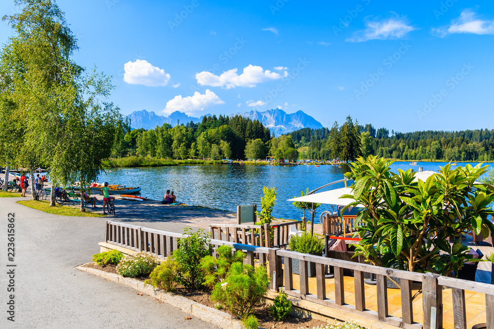 Shore of Schwarzsee lake on sunny beautiful summer day near Kitzbuhel ...