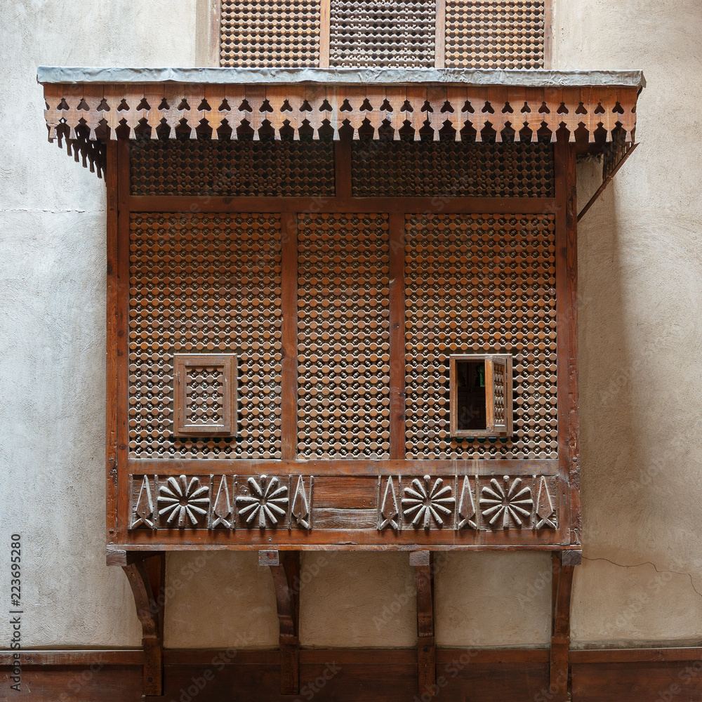 Mamluk era style oriel window covered by interleaved wooden grid ...