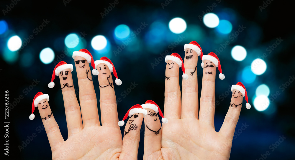christmas, holidays and body parts concept - close up of hands showing ...