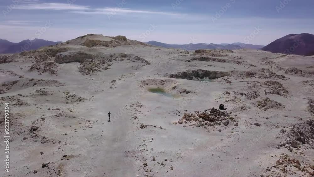Man running on the high mountain chain of the Atacama desert, 4k ...