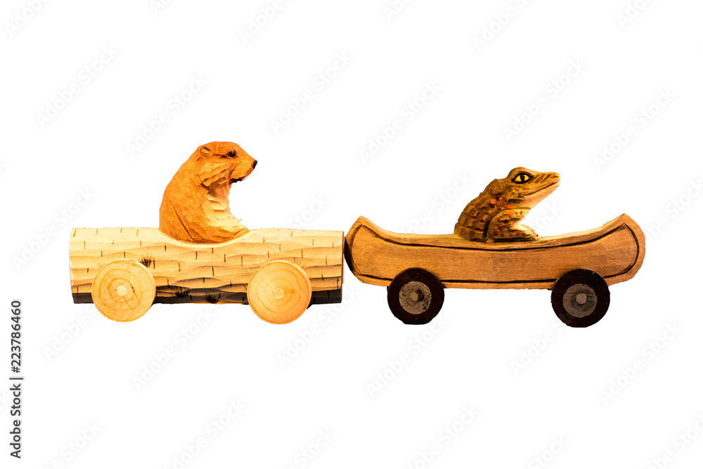 Wooden toy hedgehog and alligator driving small wood sports cars ...