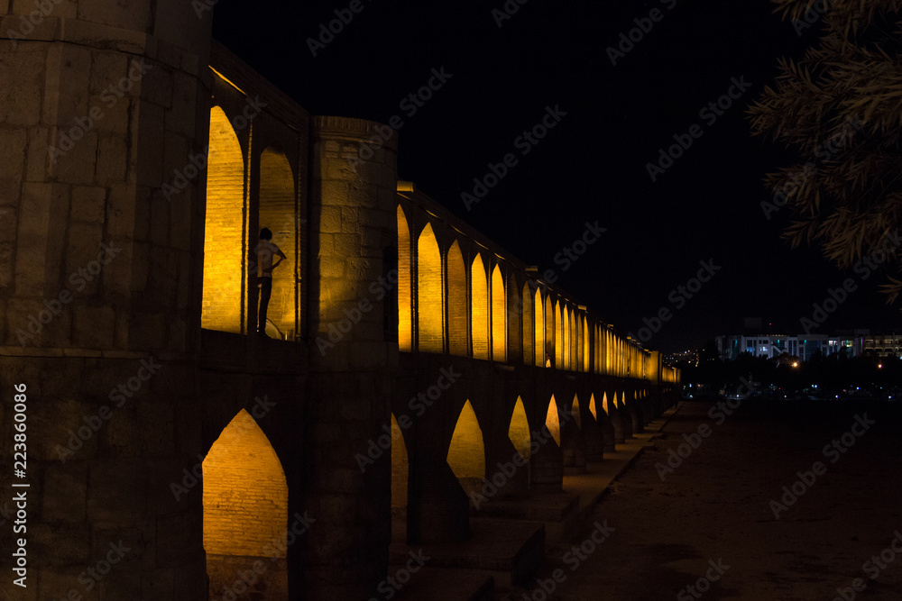 Si o Seh Pol bridge on a dark evening in Isfahan, Iran. Also known as ...