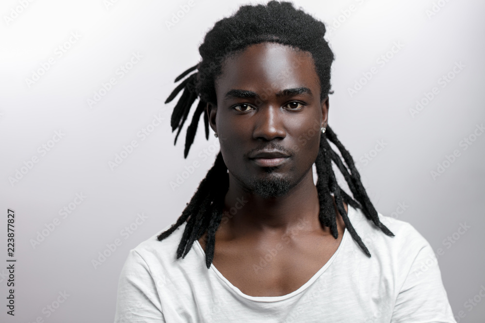 Handsome muscular black man looking camera on white backgound Stock ...