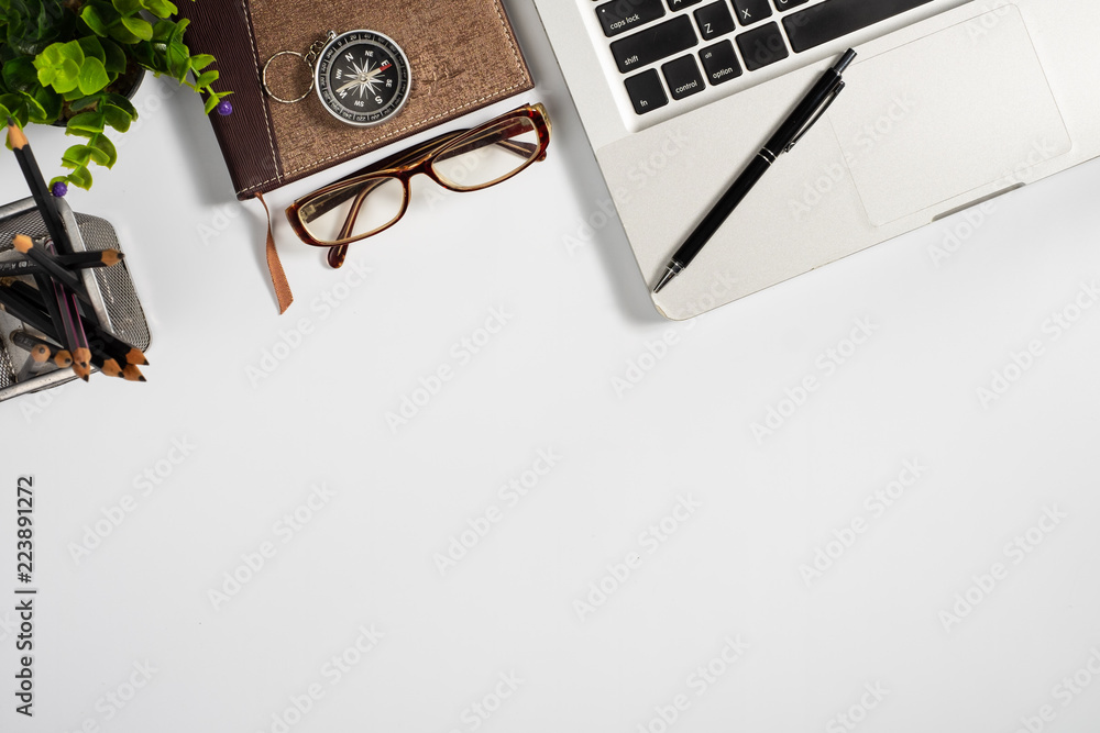 Top view of Office desk with laptop, hot coffee, plant,diary, vintage ...
