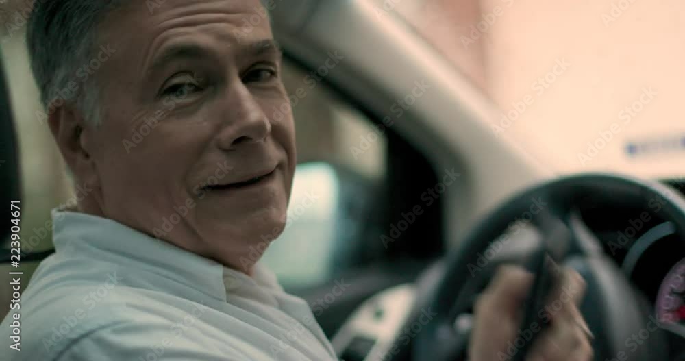 A retiree launching a second career as an Uber or Lyft driver checks ...