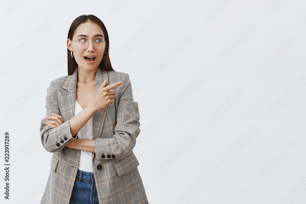 Girls Gossiping About New Coworker Portrait Of Intrigued Happy