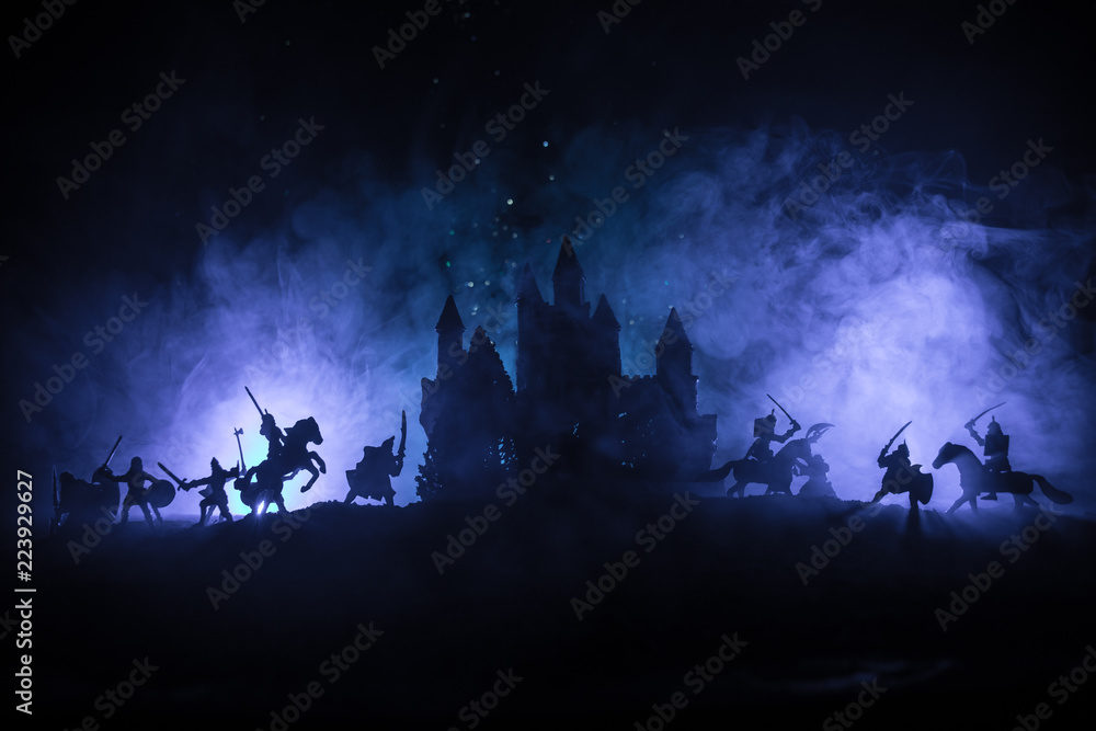 Medieval battle scene with cavalry and infantry. Silhouettes of figures ...
