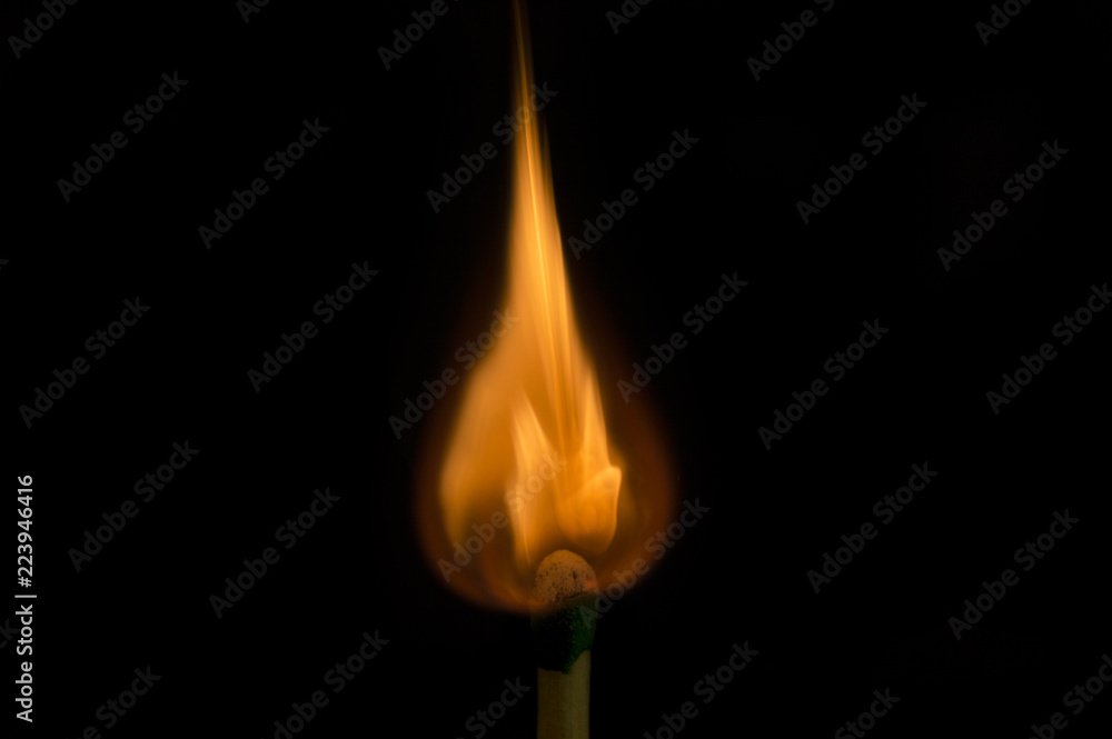 Teardrop shaped flame on tip of match being lit Stock Photo | Adobe Stock