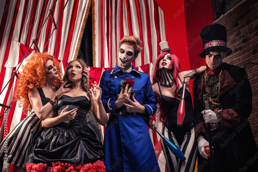Circus troupe from freak show staying on stage of daark circus Stock ...
