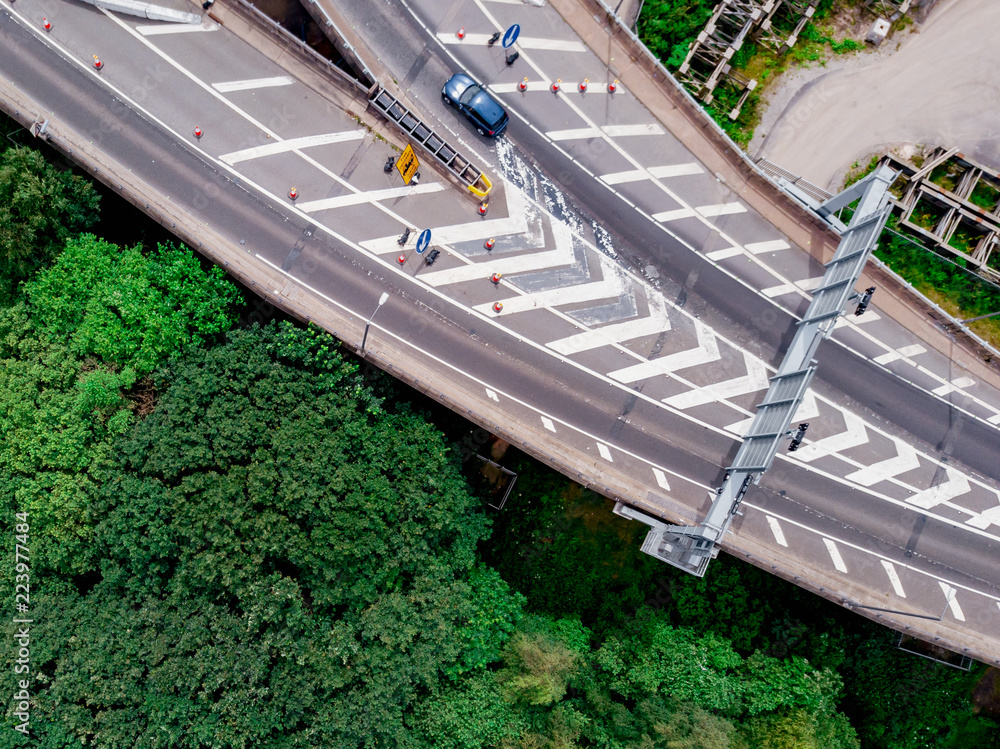Motorway complex road junction aerial view with traffic moving in the ...