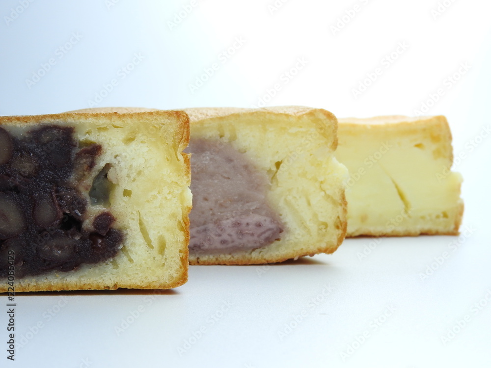 Front view of cream, red beans, and taro-flavored wheel pies ( also ...
