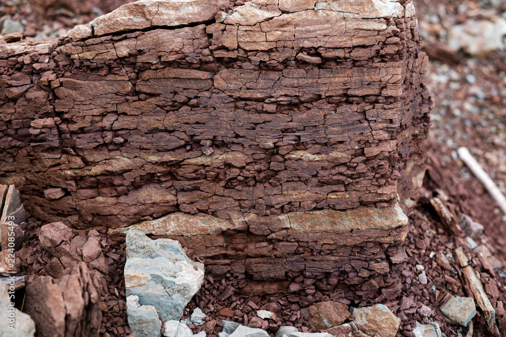 Soil cut-sandstone, stones, clay, sand structure and layers. slice of ...