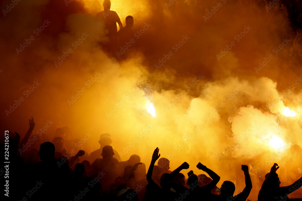 Football fans with torches during the eternal rivals have met in the ...