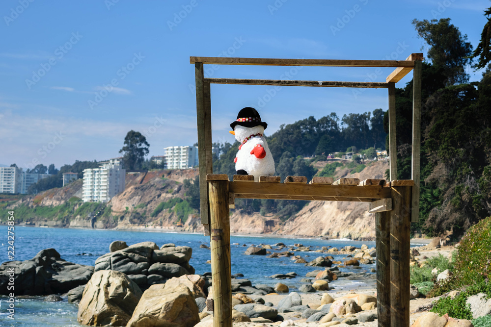 Snowman at the beach sitting on surveillance tower. Lifeguard. Vacation ...