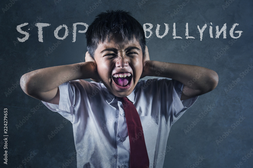 young desperate abused schoolboy screaming crying victim of bullying ...