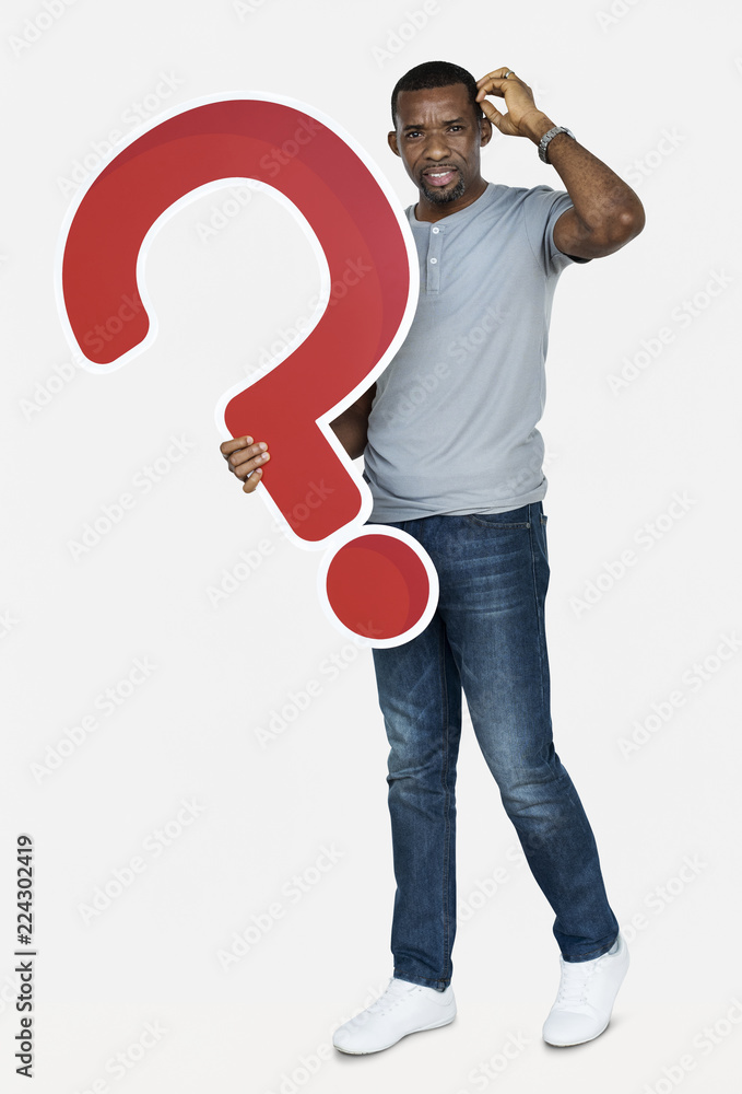 Confused man holding a question mark icon Stock Photo | Adobe Stock