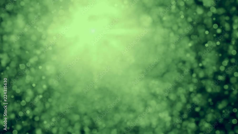 Motion graphics background. Green particles moving in all directions ...