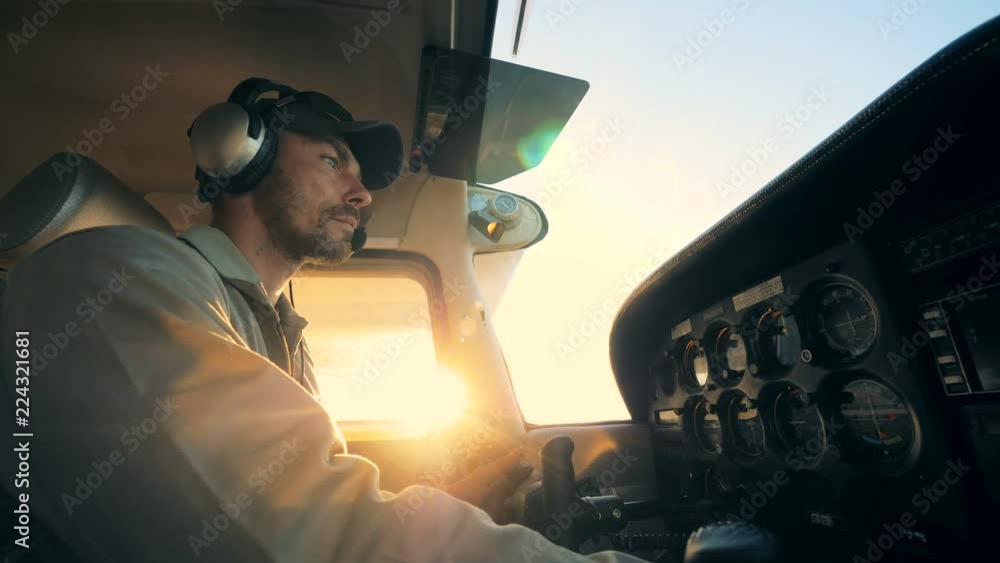 Male pilot in a plane cockpit, close up. Cockpit view. Stock Video ...