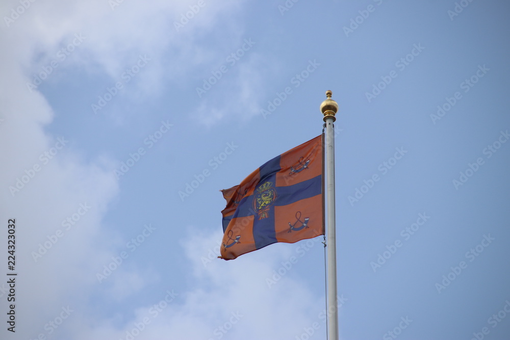 Flag of king Willem-Alexander is waving in the wind on the Noordeinde ...