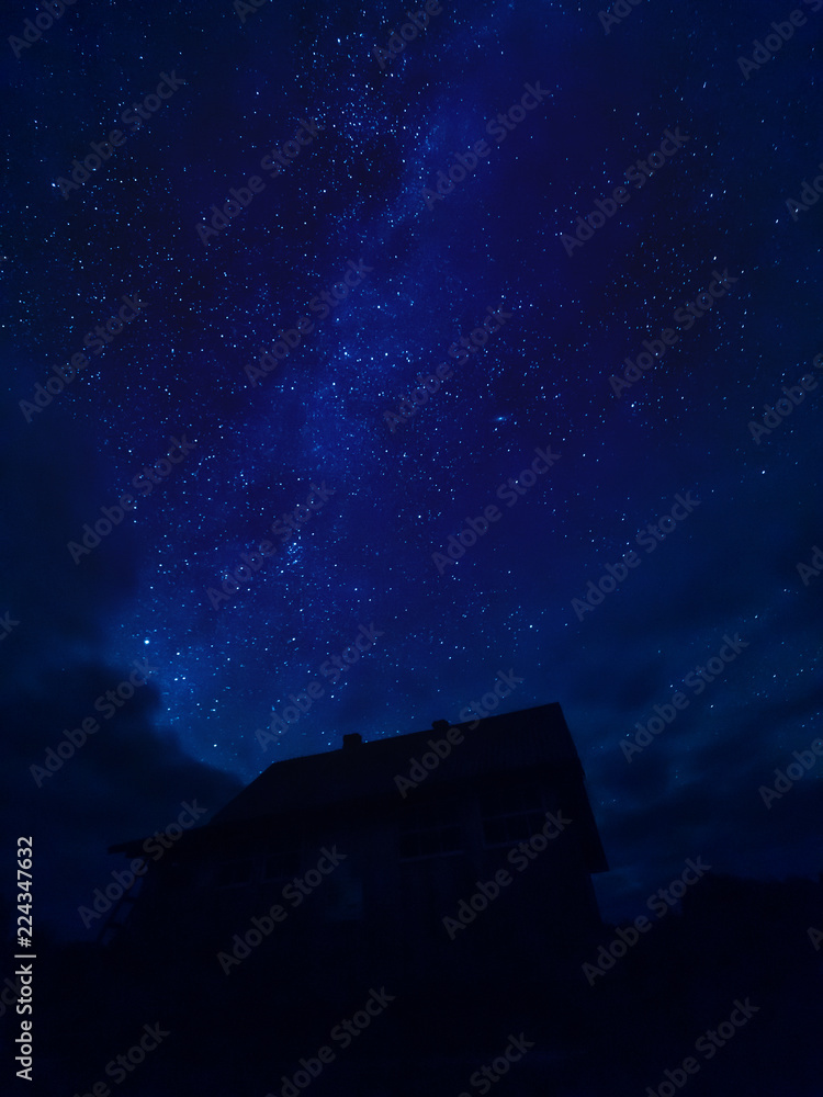 Cloudy Starry Night Sky
