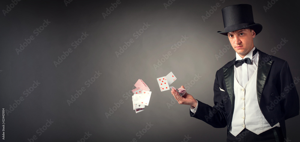 Magician Holding Cards
