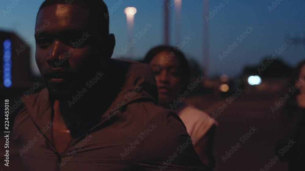 multi ethnic group athletes running race competitive women overtaking ...