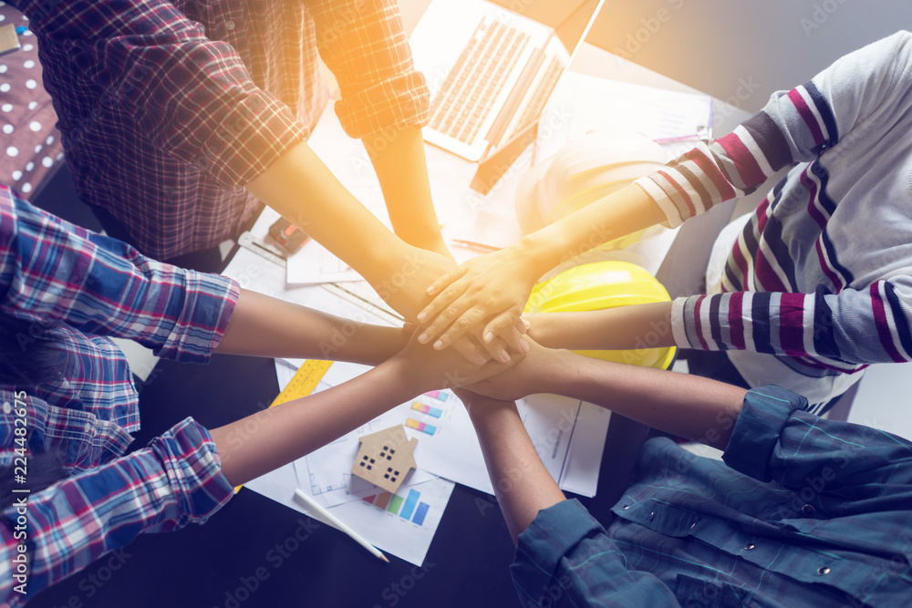 business people group partnership joining hands up and representing ...