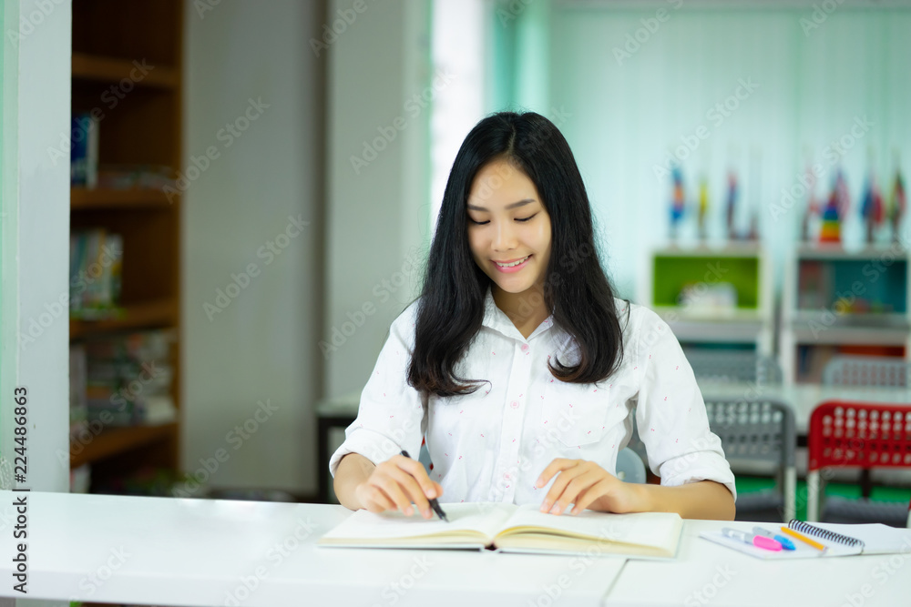 Foto de School Education concept, young Asian student studying and ...