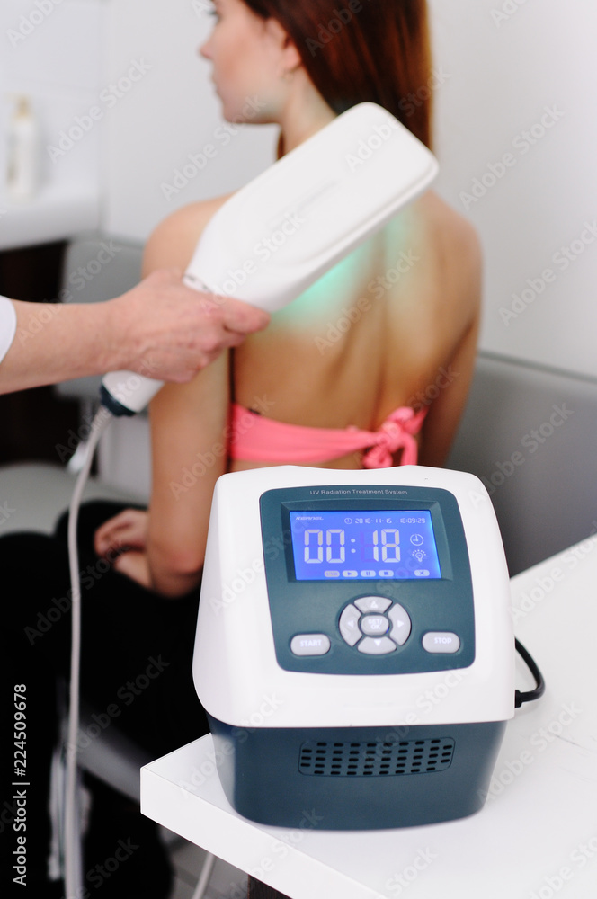 doctor spends psoriasis treatment using ultraviolet lamps and ...