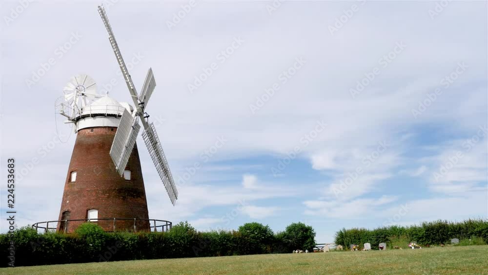Traditional Old English Windmill. A quaint rustic scene with a ...