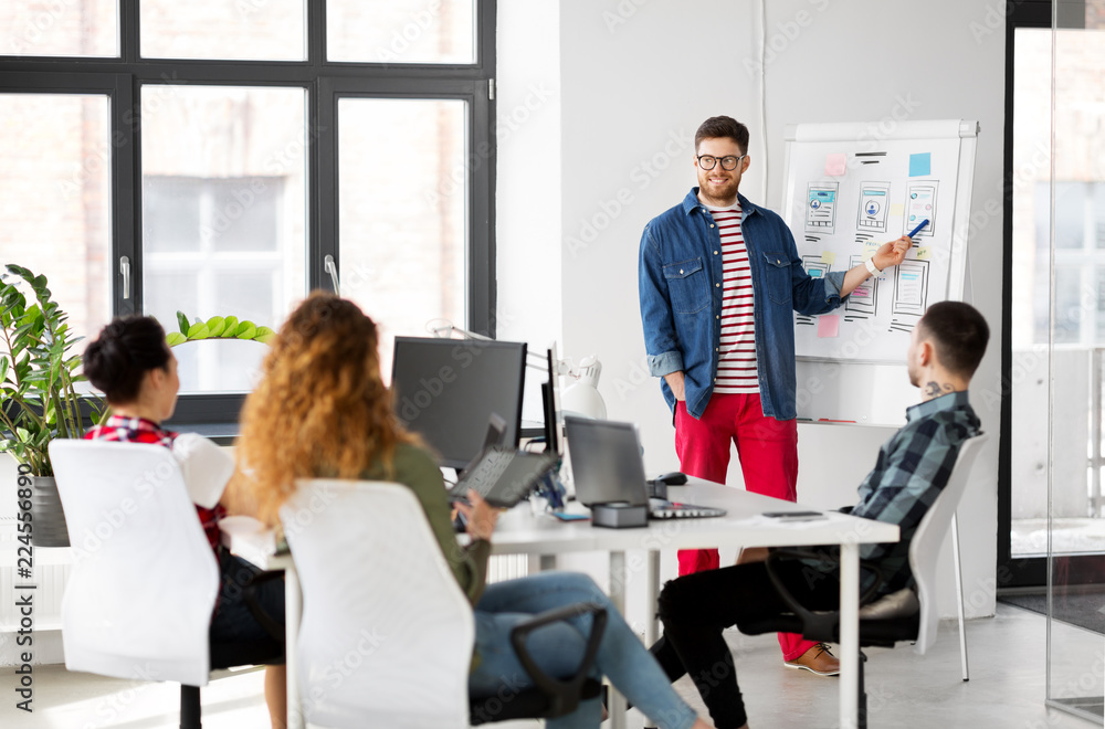 business, technology and people concept - man showing user interface ...
