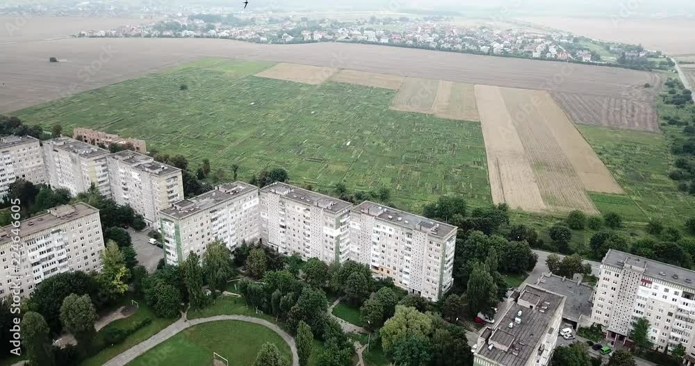 Aerial view of town with socialist soviet style of building at cloudy ...