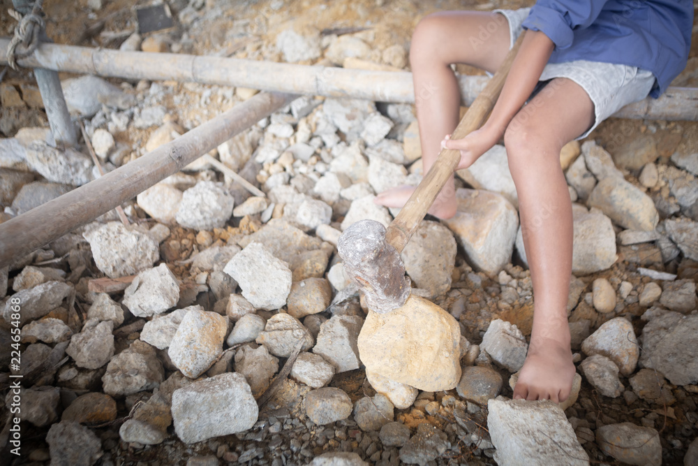 Little girl labor working in commercial building structure, World Day ...