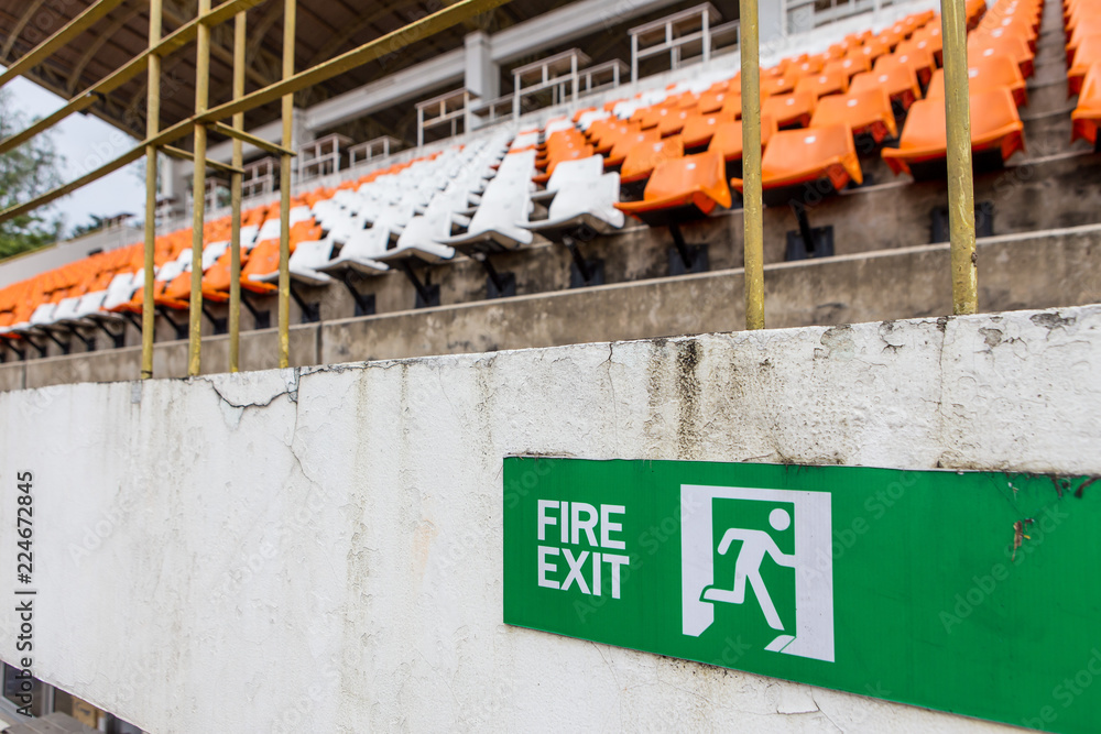 fire exit sign in the stadium Stock Photo | Adobe Stock