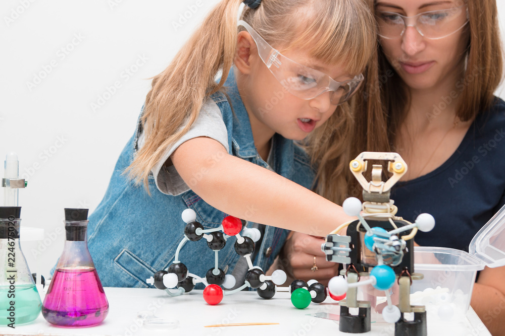 Science school, Museum of Science. A woman teacher and girl child ...