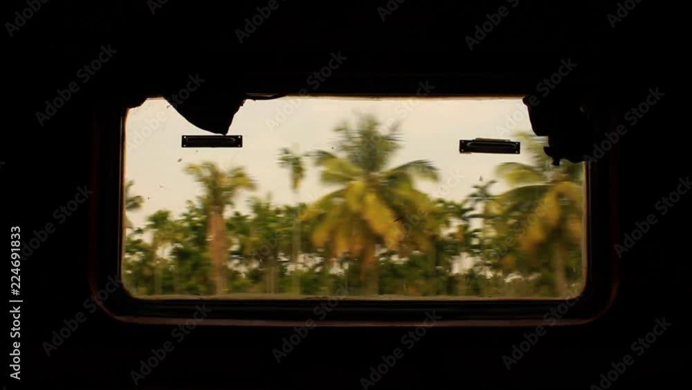 Steady window point of view shot of an Indian train air conditioned ...
