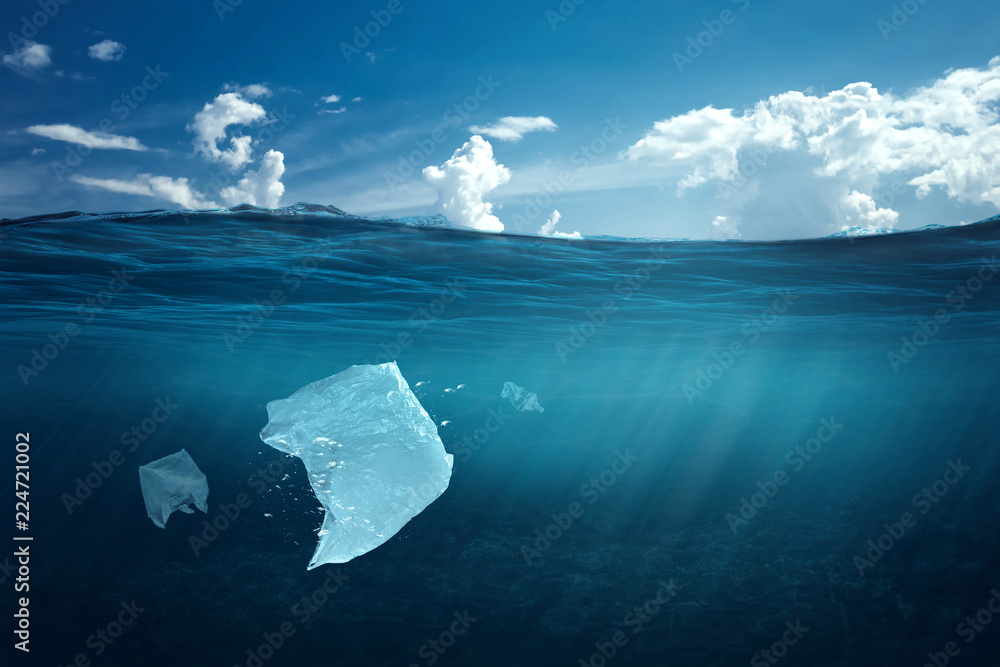 Creative background, plastic bag floating in the ocean, a bag in the ...