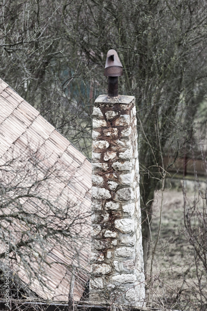 Simple stone made chimney in a small village of Torocko, Transylvania ...